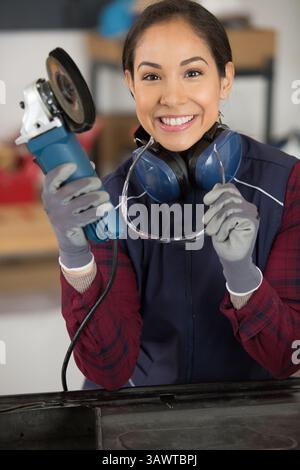 Hand-held Electric Angle-Grinder against a white background Stock Photo ...