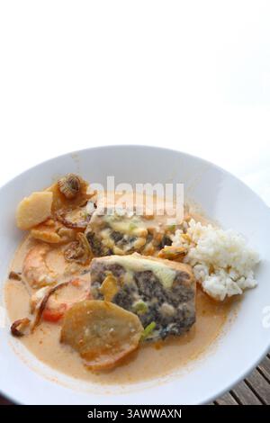 fresh cod fish receipt ready to eat as sea food dish Stock Photo - Alamy