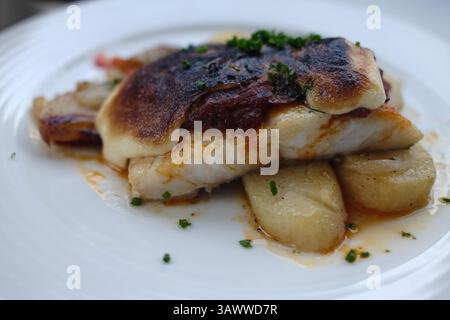 fresh cod fish receipt ready to eat as sea food dish Stock Photo - Alamy
