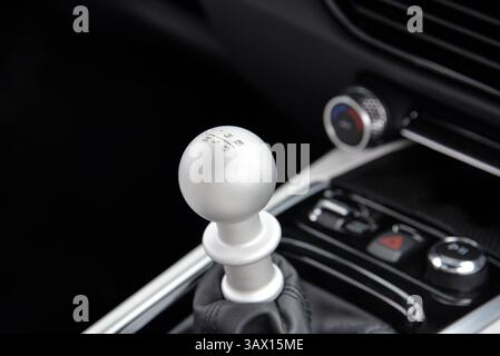 The shifter and center console of a Lotus at a car show Stock Photo - Alamy