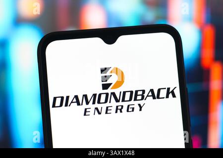In this photo illustration, the Diamondback Energy company logo is seen ...
