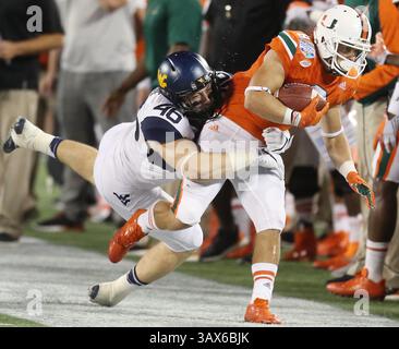 West Virginia wide receiver Reese Smith (15) gestures during an NCAA ...