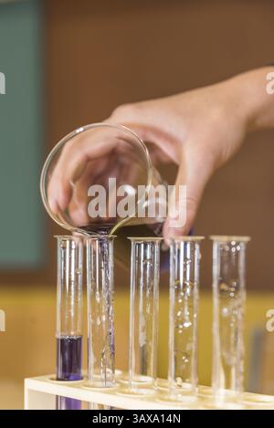 Chemical experiment in school with dye - acid and base reaction Stock ...