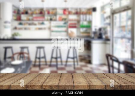 An empty wooden countertop against a brick wall Stock Photo - Alamy