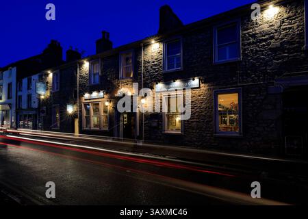 Dusk view of the Golden Lion pub in Settle town, North Yorkshire ...