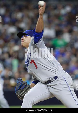 Los Angeles Dodgers' Julio Urias prepares to bat during a baseball game ...