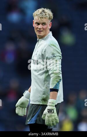 Tottenham Hotspur goalkeeper Antonin Kinsky celebrates with the trophy ...