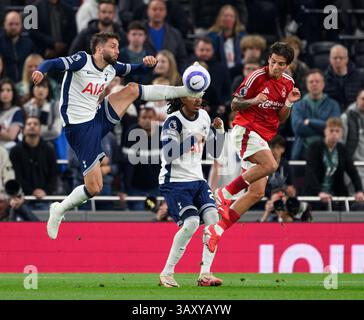 Tottenham Hotspur's Rodrigo Bentancur (left) attempts a shot on goal ...