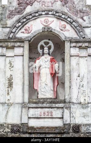 The Christ the King statue stands atop the pediment of St John ...