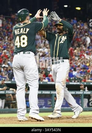 Texas Rangers' Marcus Semien celebrates after hitting a home run ...
