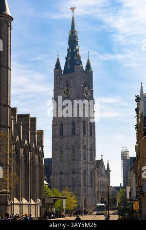 The famous bell tower Het Belfort van Gent in Belgium with a cloudy sky ...