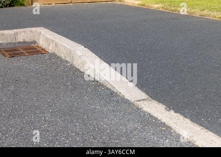 New dropped kurb installation for vehicle access to driveway Stock ...