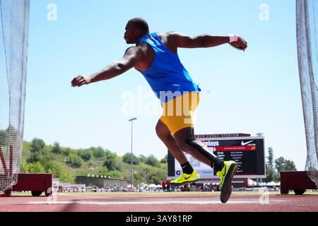 Michael Pinckney (3597) of UCLA places third in the discus at 188-10 ...