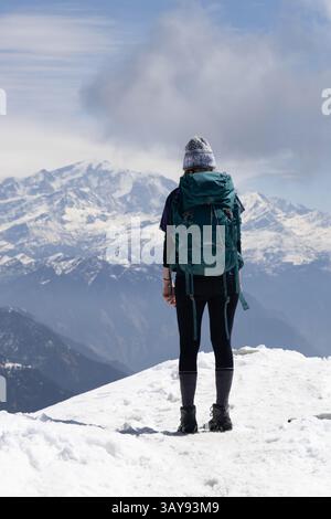 Solo Backpacker Trekking on the mountain in autumn trought foliage ...