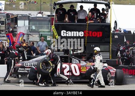 Joey Logano makes a pit stop during a NASCAR Cup Series auto race at ...