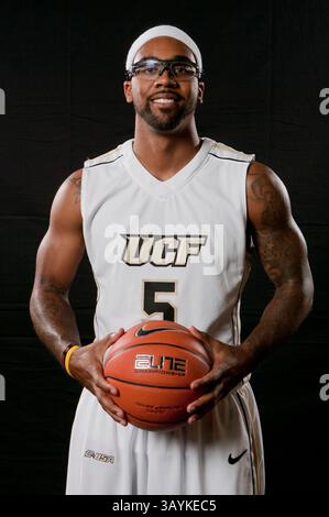 Central Florida guard Marcus Jordan (5) passes over NC A&T guard R.J. Buck (21) in Orlando ...