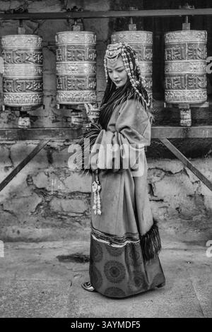 The act of spinning the wheel, known as mani khorlo, is a traditional ...