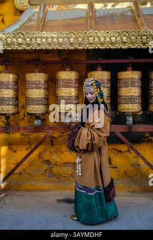 The act of spinning the wheel, known as mani khorlo, is a traditional ...