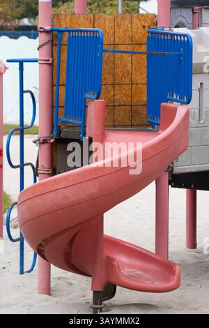 red slide at kids playground Stock Photo - Alamy
