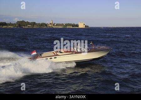 Aerial view sports boat J Craft 42 Torpedo R at full speed off the Iles ...