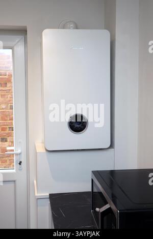 Servicing a modern Worcester gas combi boiler Stock Photo - Alamy