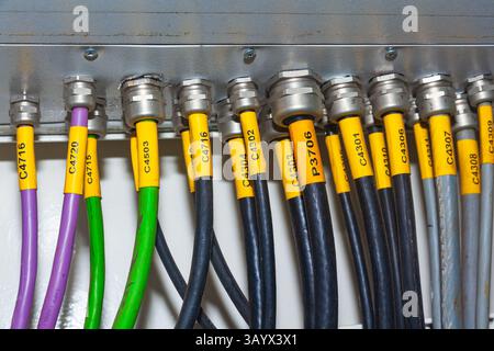 Several powerful electrical cables connected to a junction box Stock ...