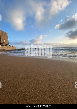 Waves washing onto the beach near Barcelona, Spain Stock Photo - Alamy