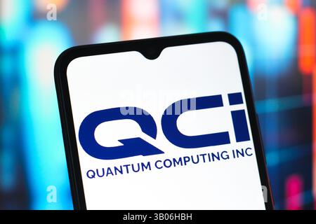 In this photo illustration, a The Quantum Computing Company logo is ...