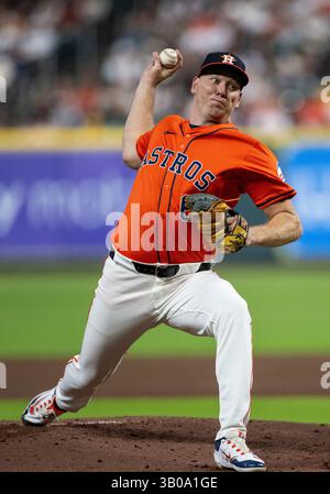 Houston Astros pitcher Ryan Gusto throws to an Athletics batter during ...