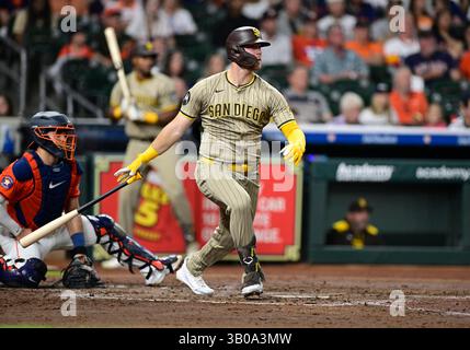 San Diego Padres' Gavin Sheets follows through on a swing in the fourth ...