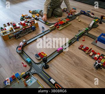 Child playing with wooden car toys one little boy plays with ...