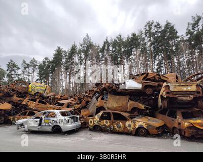 Burnt civilian cars in Irpin as a result of the war Stock Photo - Alamy