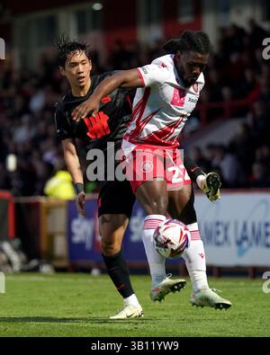 Birmingham City's Myung-Jae Lee (left) and Stevenage's Daniel Phillips ...