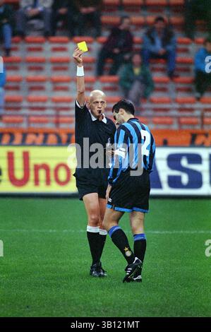 Milan Italy, 1995, Referee Pierluigi Collina gives the footballer ...