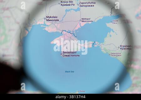 Map of Crimea seen through magnifying glass on Google maps. Crimea is a ...