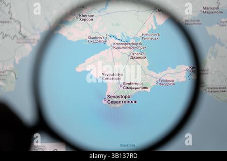 Map of Crimea seen through magnifying glass on Google maps. Crimea is a ...