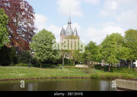 Defensive wall, canal Stadsgracht of the Dutch city of Zwolle. Fountain ...