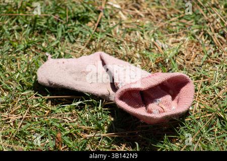 inside out lost pink sock Stock Photo - Alamy