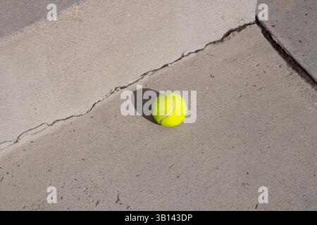 neon yellow tennis ball outdoors Stock Photo - Alamy