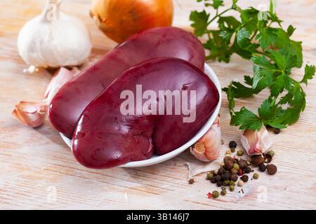 Raw pork kidneys ready for cooking Stock Photo - Alamy