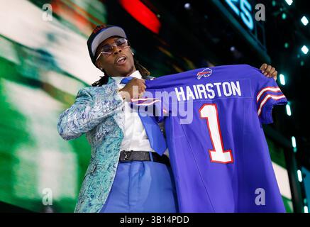 Buffalo Bills cornerback Maxwell Hairston, right, runs drills with ...