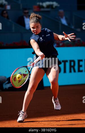Jasmine Paolini of Italy plays a forehand return to Jessica Pegula of ...