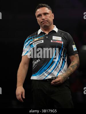 Gerwyn Price reacts during his match against Gian van Veen on night ...