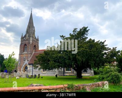 St Michael’s Church in Tilehurst, Reading seen against a blue sky Stock ...