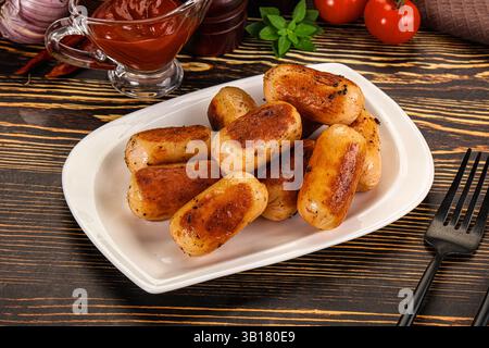 Roasted chicken mini sausages for breakfast in the bowl Stock Photo - Alamy