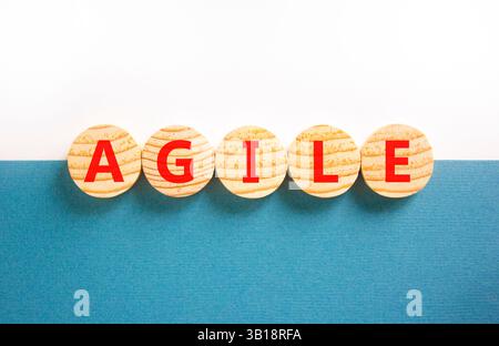 Flexible and agile symbol. Concept word Flexible and agile on wooden ...