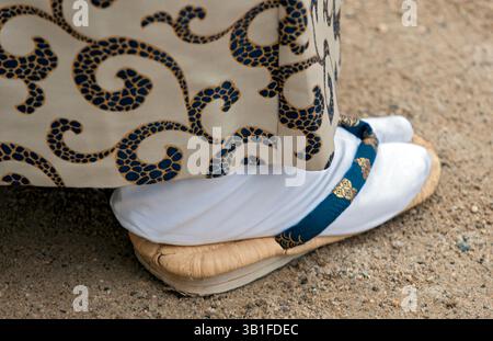A participant in the Hikone Castle Festival is dressed in traditional ...