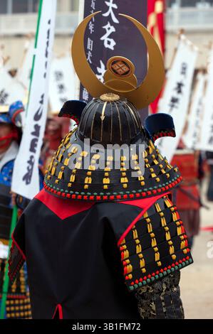 Samurai warrior in full armor costume with kabuto helmet participates ...