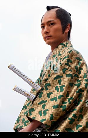 High-level samurai wearing the traditional chonmage (topknot) hairstyle ...