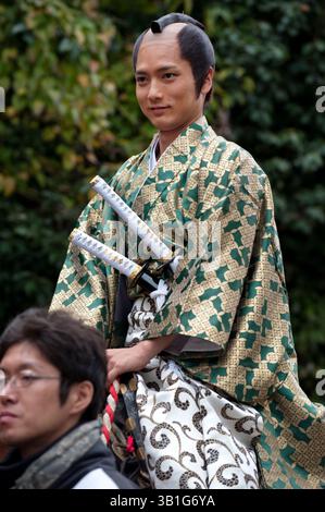 High-level samurai wearing the traditional chonmage (topknot) hairstyle ...